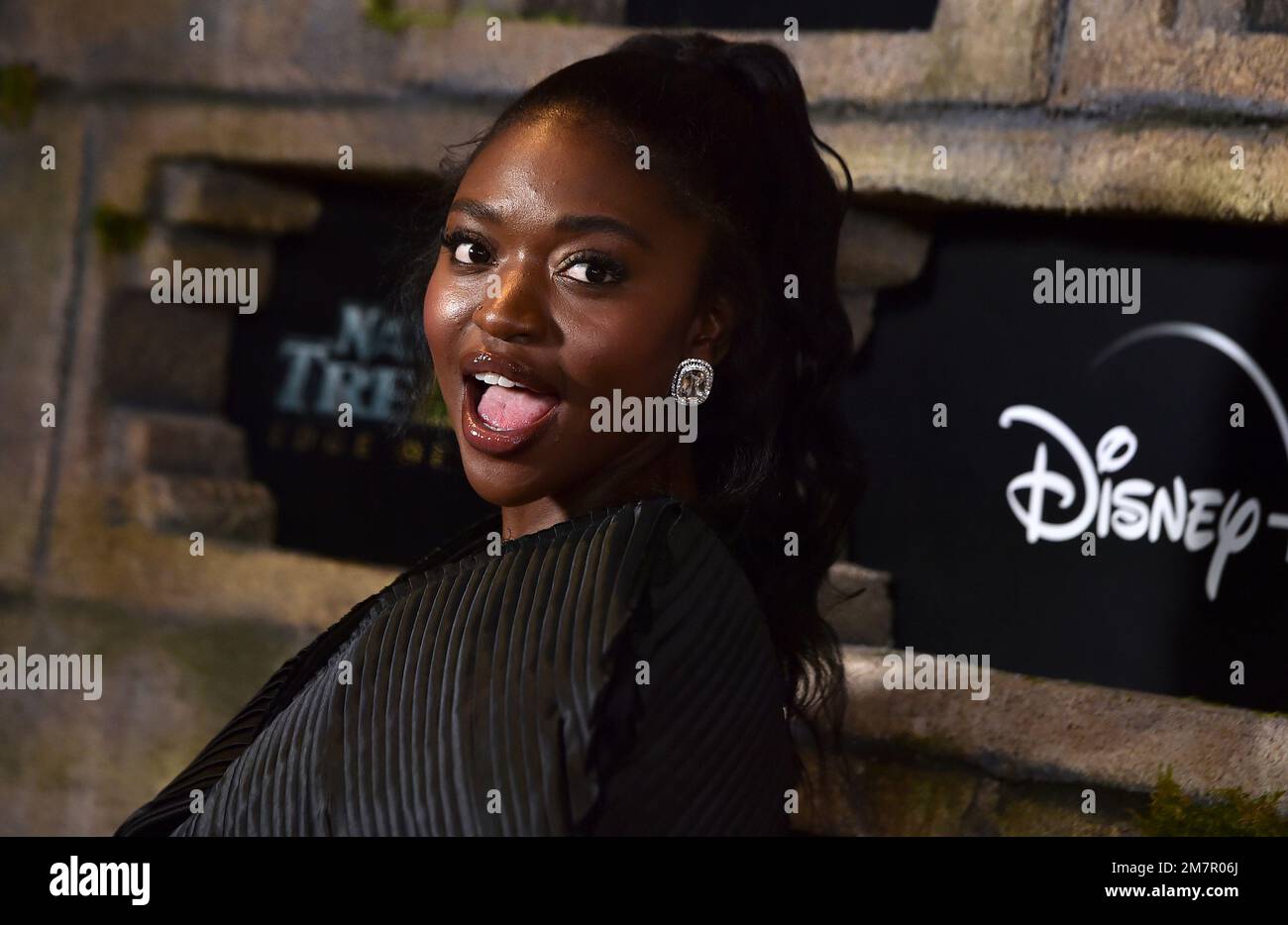 Zuri Reed arrives at a red carpet event for "National Treasure: Edge of ...