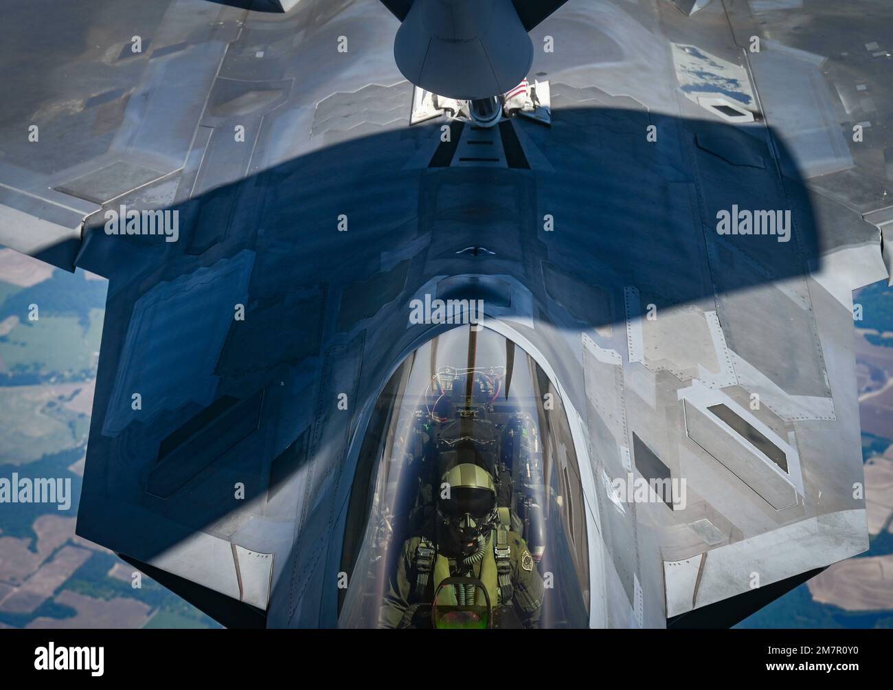 A U.S. Air Force F-22 Raptor with the 325th Fighter Wing, approaches a ...