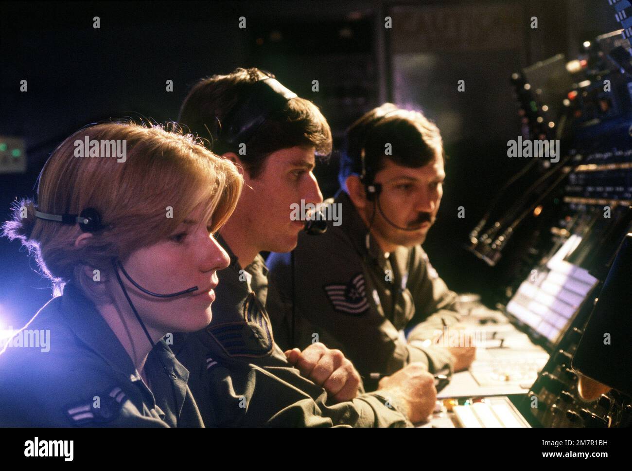 Ground controlled approach (CGA) controllers, left to right, AIRMAN 1ST ...