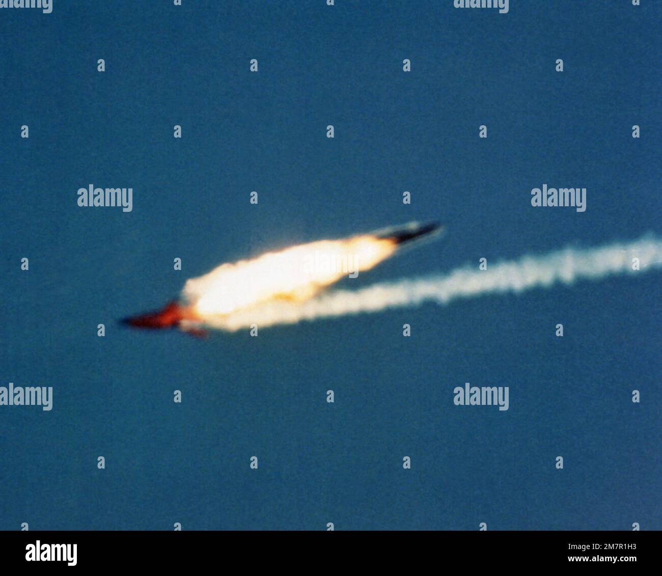 A Standard-ER/SM-2 (RIM-67) surface-to-air missile, right, just ...