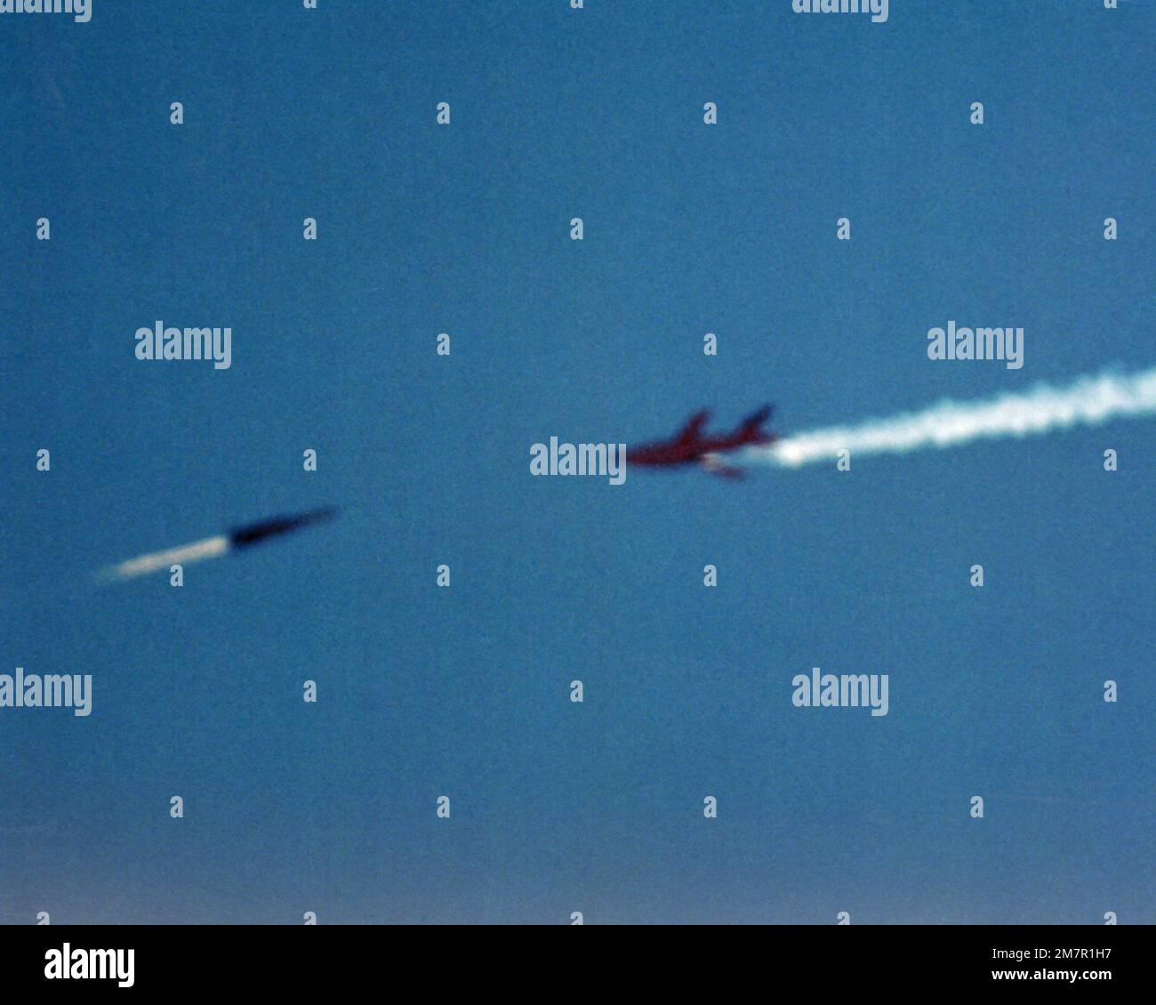 A Standard-ER/SM-2 (RIM-67) surface-to-air missile, right, just ...