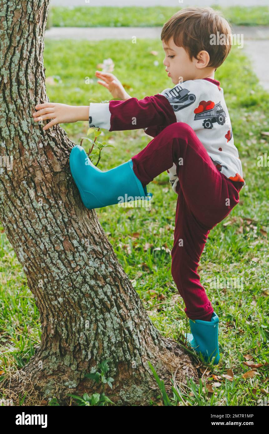 Little Boy Wearing Rain Boots