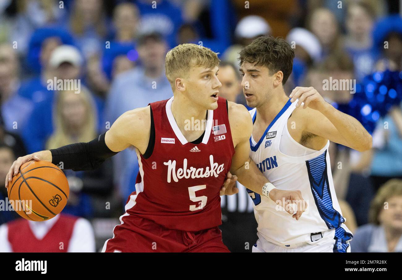 Nebraska's Sam Griesel, left, drives against Creighton's Francisco ...