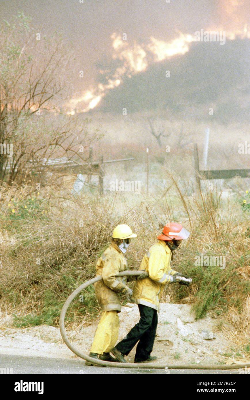 Firefighters battle fires in farmland during the four-day Panorama ...
