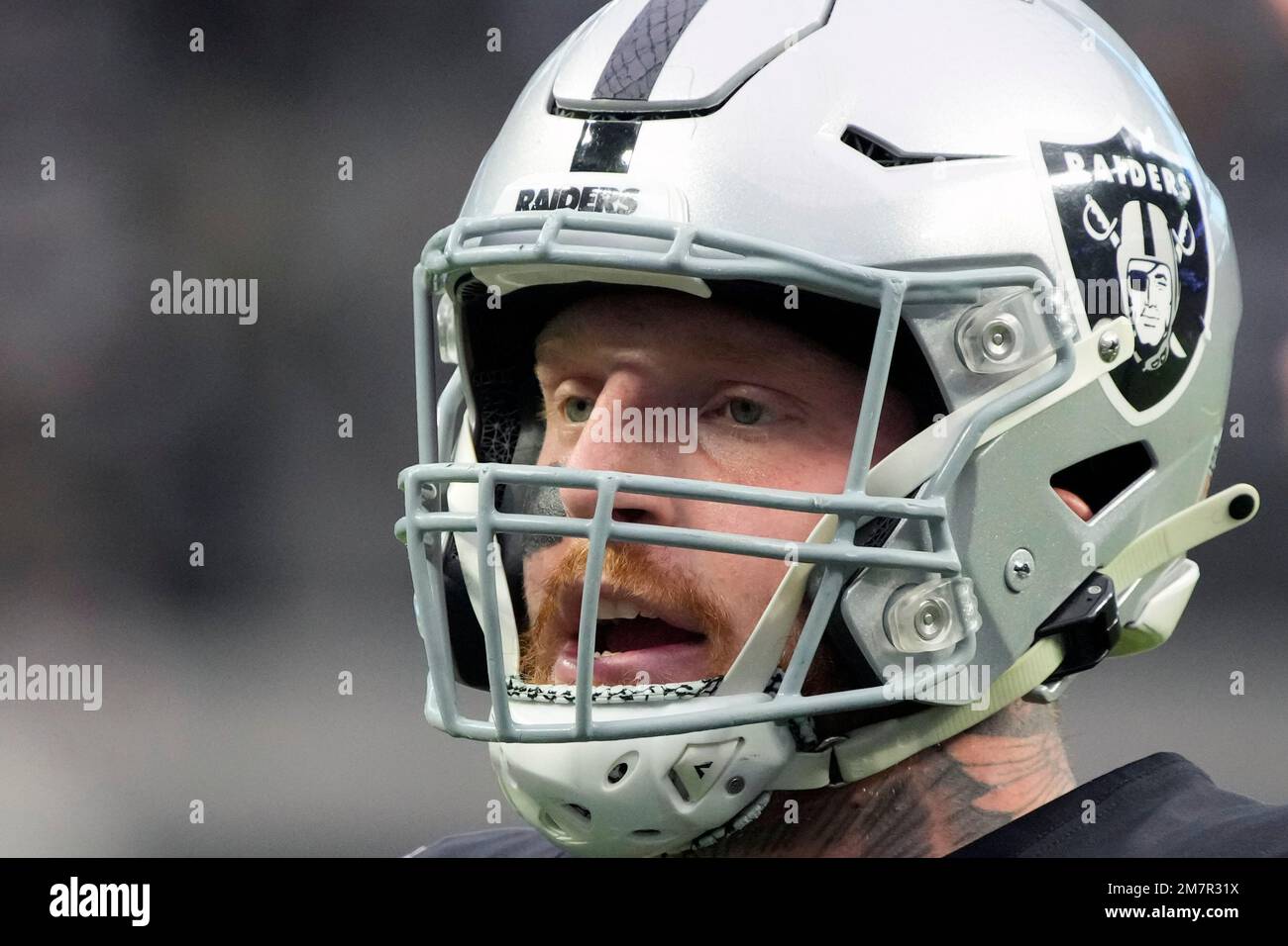 Las Vegas Raiders defensive end Maxx Crosby (98) warms up before an NFL ...