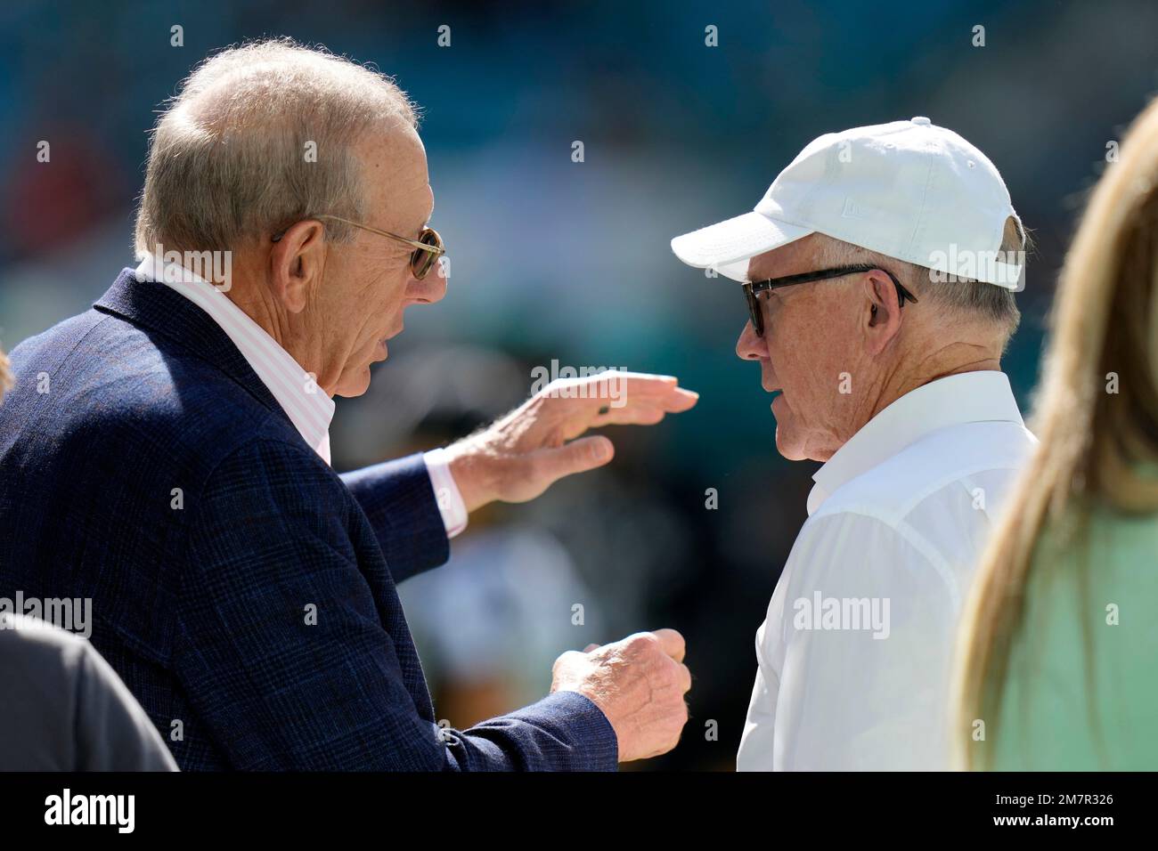 Miami Dolphins owner Stephen Ross, left, talks with New York Jets owner ...