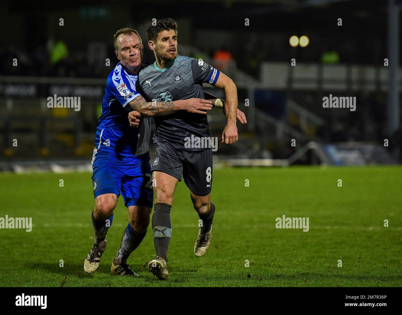 Plymouth Argyle midfielder Joe Edwards (8) battles for possession ...