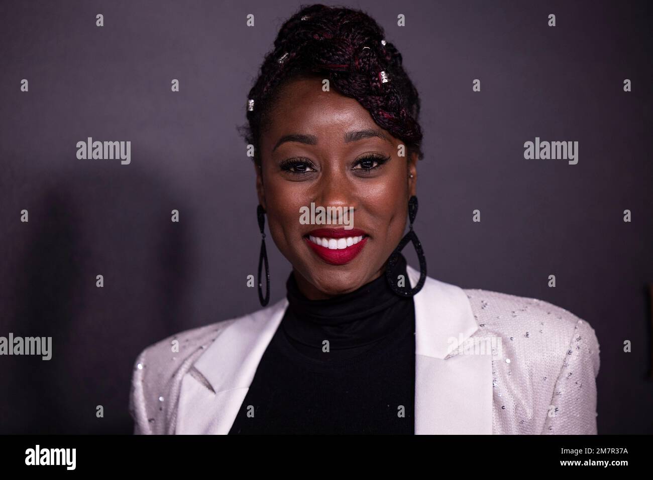 Scarlett Douglas poses for photographers upon arrival for the premiere ...