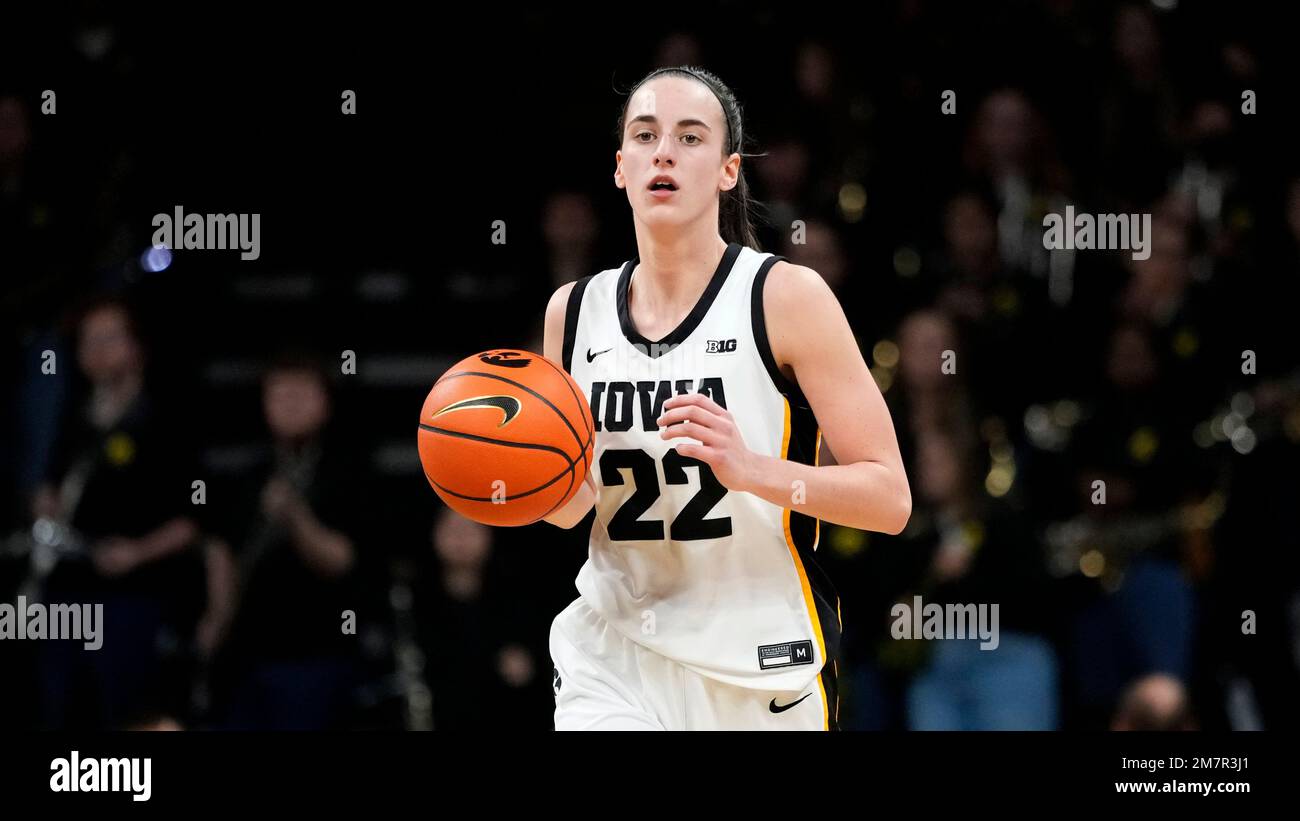 Iowa guard Caitlin Clark drives up court during an NCAA college ...