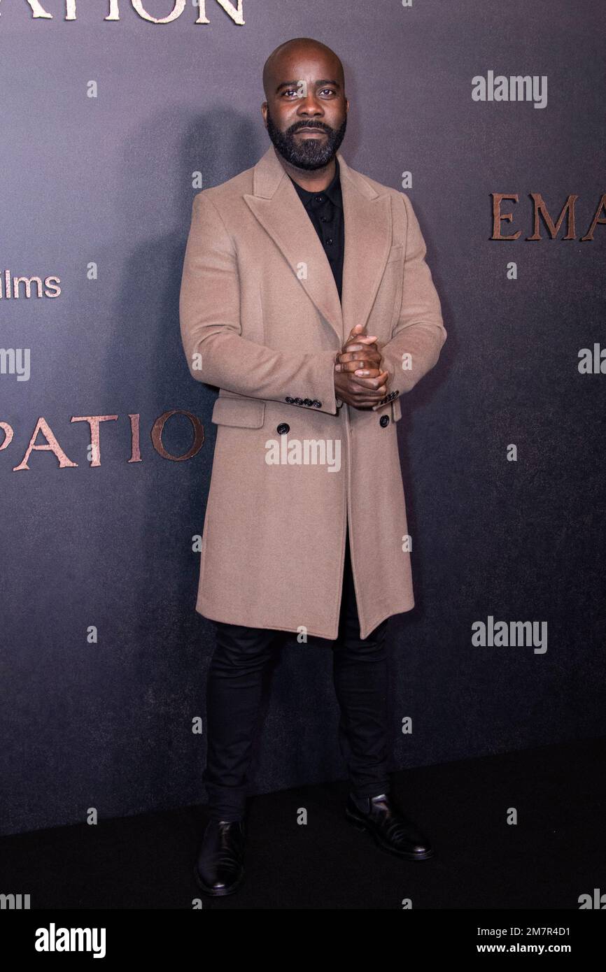 Melvin Odoom poses for photographers upon arrival for the premiere of ...