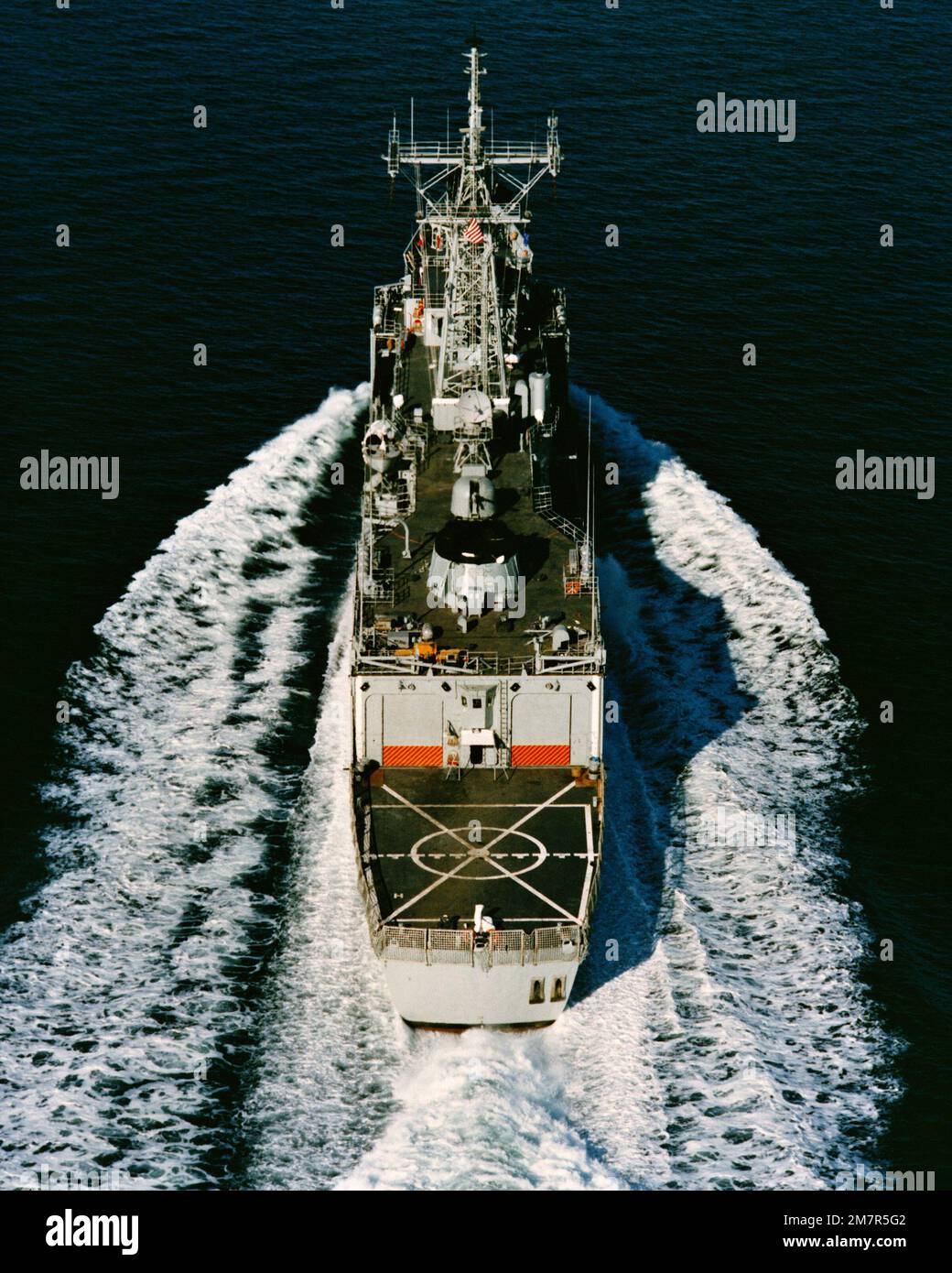 An aerial stern view of the Australian frigate CANBERRA (F-02) as Todd ...