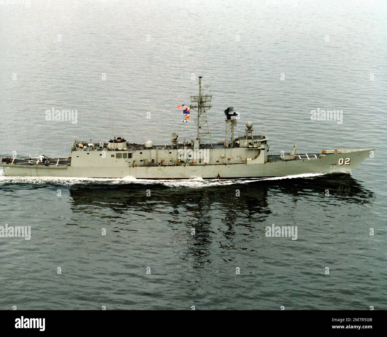 An aerial starboard beam view of the Australian frigate CANBERRA (F-02 ...