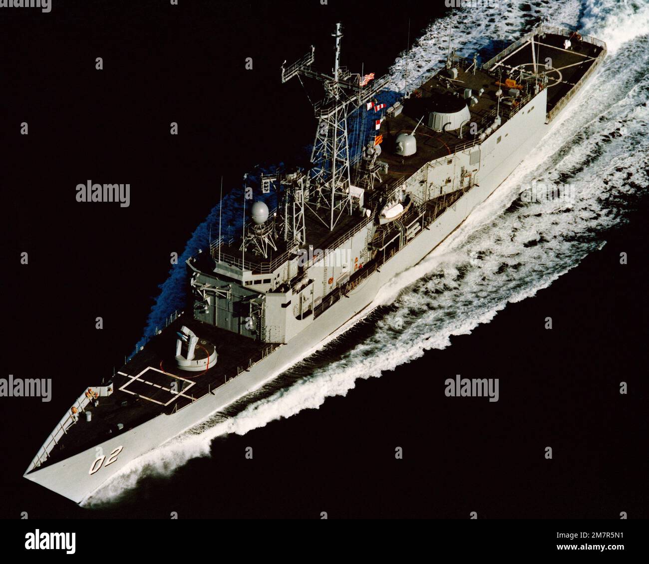 An aerial port bow view of the Australian frigate CANBERRA (F-02) as ...