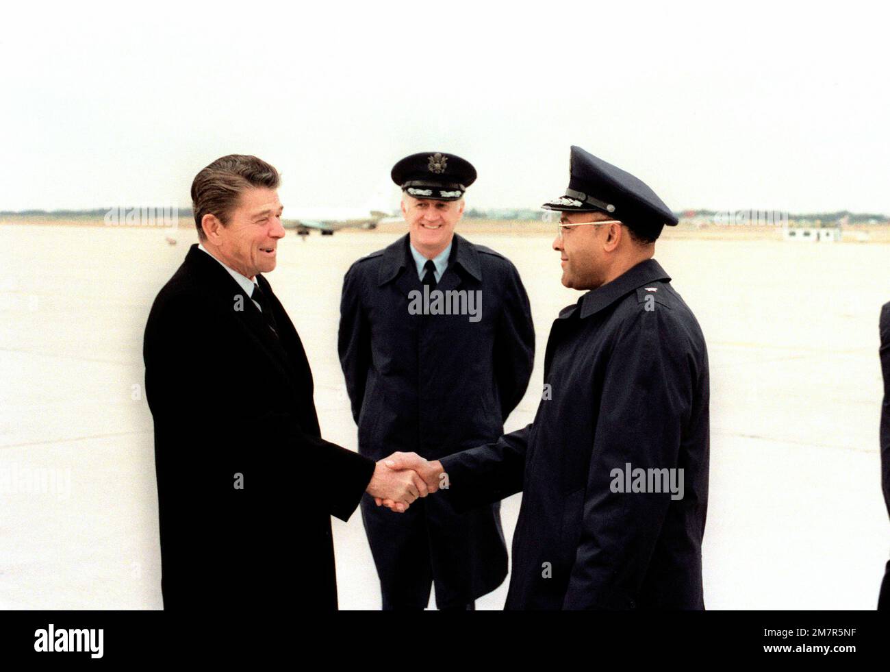 President-elect Ronald W. Reagan is greeted by BGEN Archer Durham upon ...