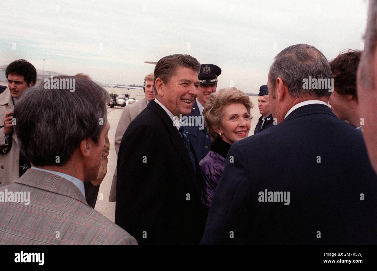 President-elect Ronald W. Reagan and his wife, Nancy, talk to well ...