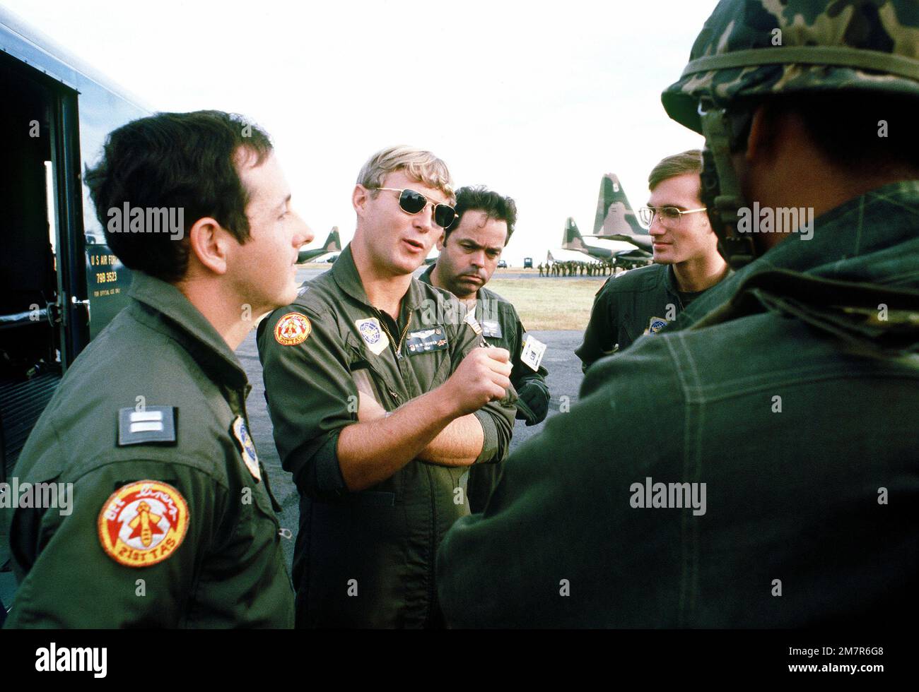 Members of the 21st Tactical Airlift Squadron give the Philippine army ...