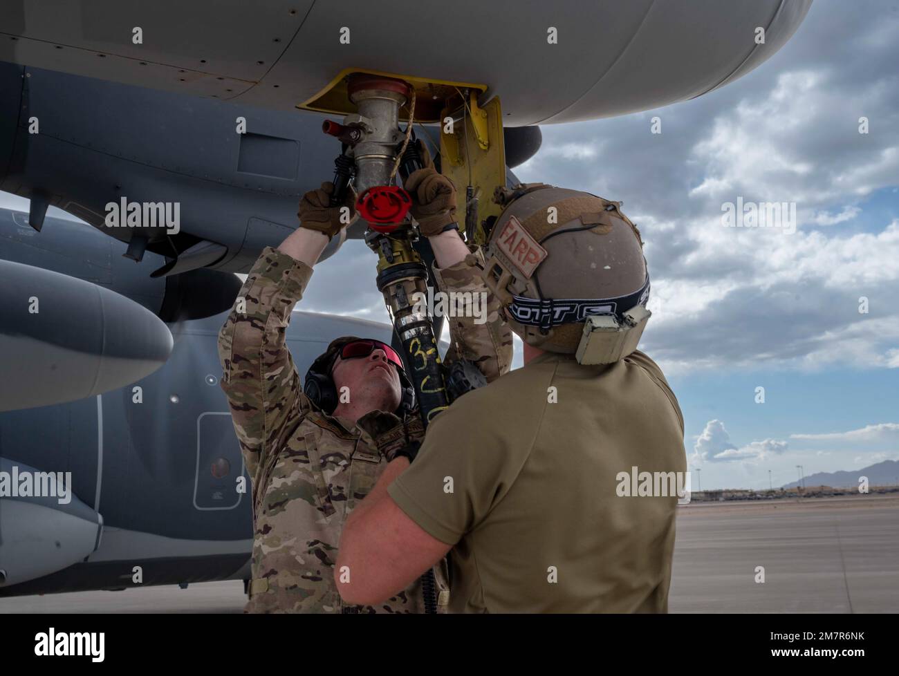 Airmen from Davis-Monthan Air Force Base, Arizona, prepare equipment to ...