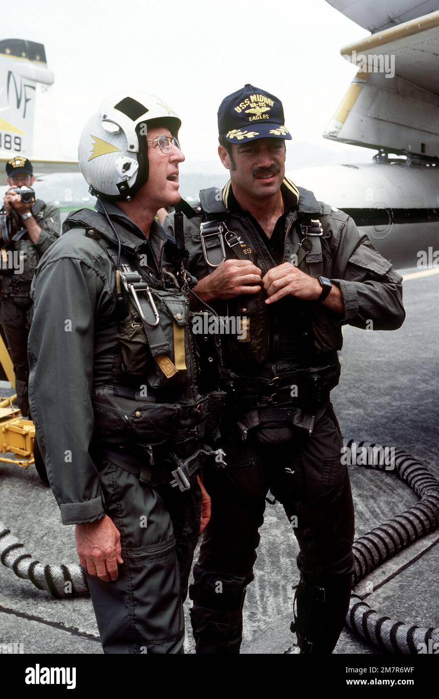 ADM Thomas B. Hayward, CHIEF of Naval Operations (left), is briefed by ...