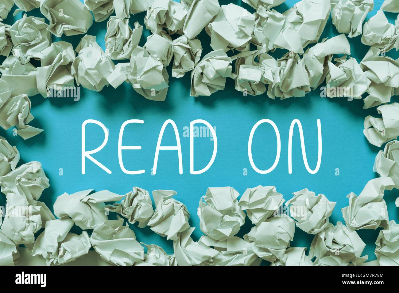 Hand writing sign Read On. Concept meaning spend time reading in order ...