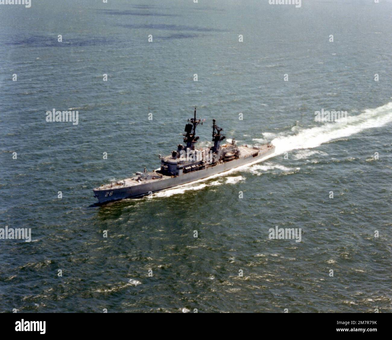 An aerial port bow view of the guided missile cruiser USS BELKNAP (CG ...