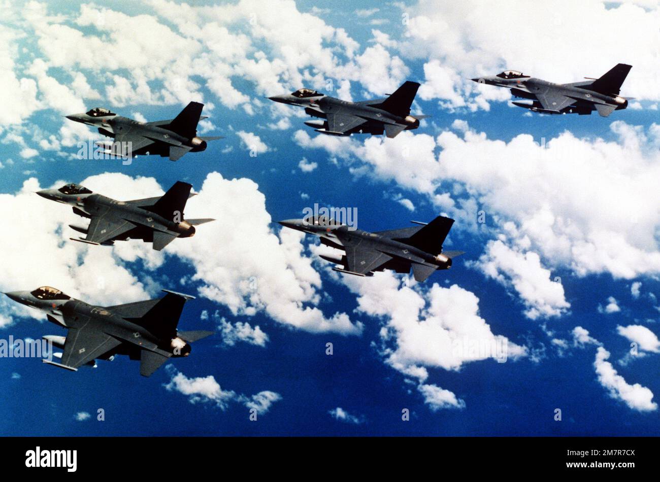 A view of a six-ship delta formation of F-16A Fighting Falcon aircraft ...