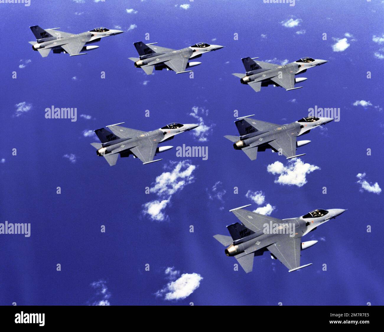 A right view of a six-ship delta formation of F-16A Fighting Falcon ...