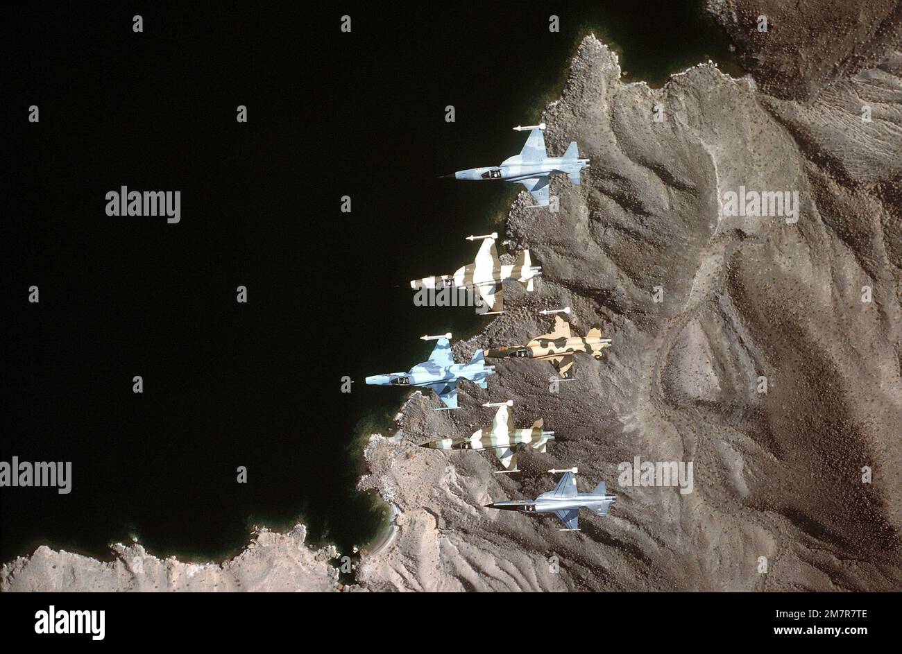 AN air-to-air overhead view of a six-ship delta formation of F-5E Tiger ...