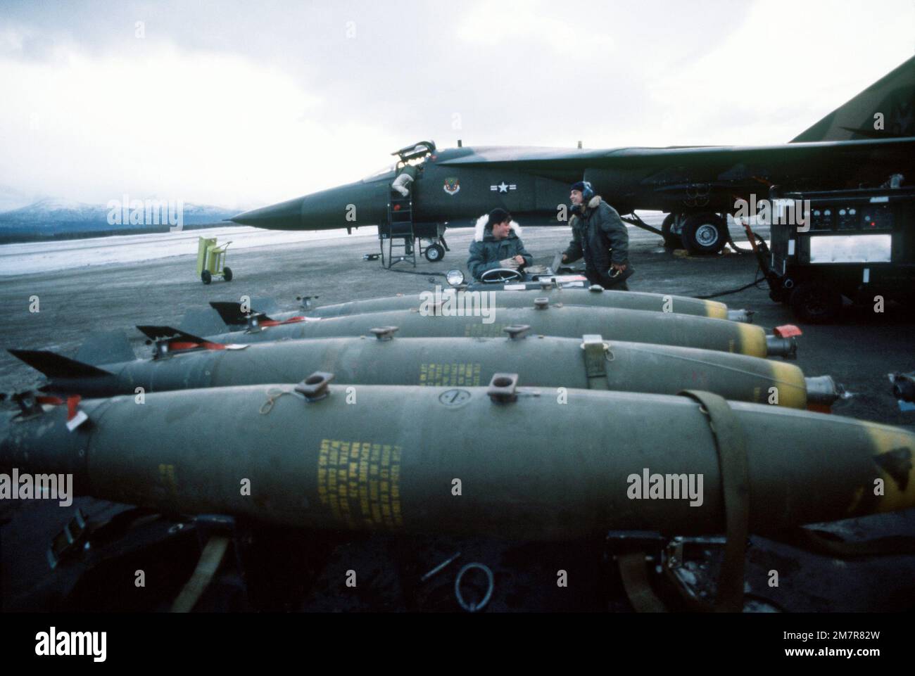 Airmen prepare to load Mark 82 500-pound laser-guided bombs on an F ...