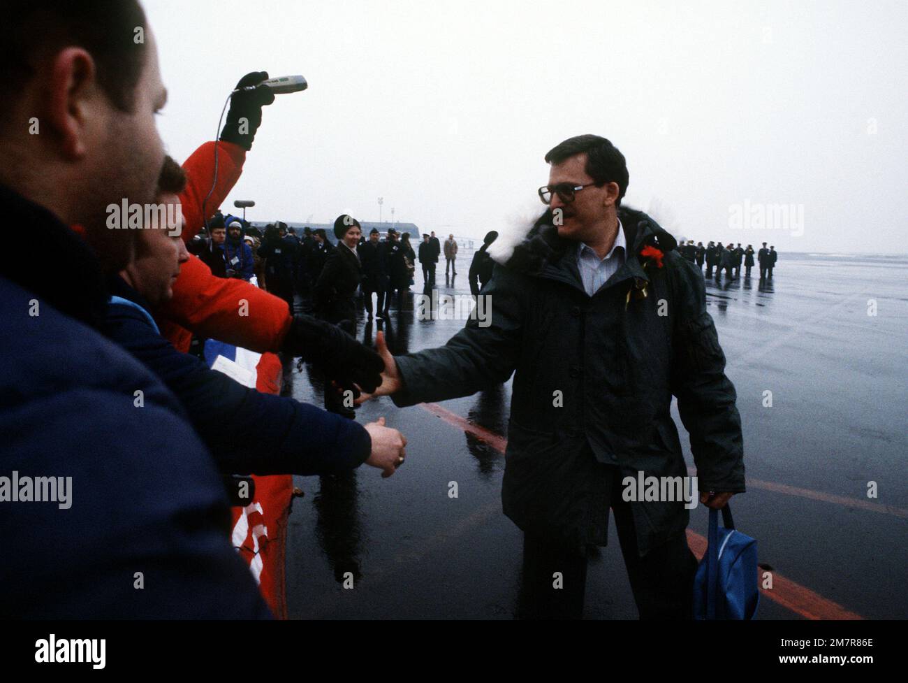 Former hostage Bruce German arrives at the base for his departure to ...