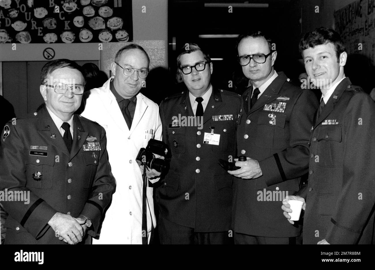 Former hostages Army COL Leland Holland, far left, Air Force CPT Paul ...