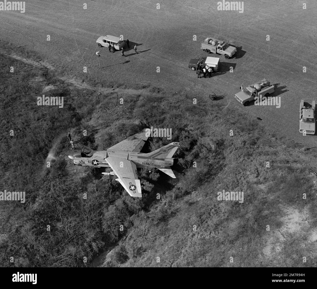 An Attack Squadron 66 (VA-66) A-7E Corsair II aircraft rests in the ...