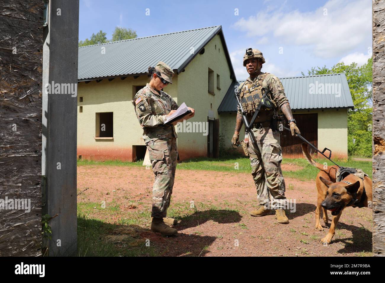 U.S. Army Military Working Dog rater Sgt. Maj. Viridiana Lavalle, gives ...