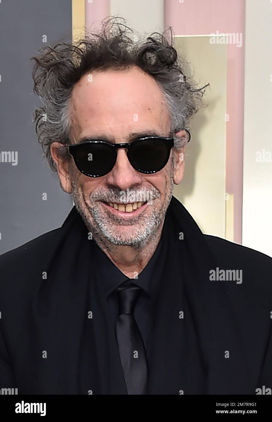 Tim Burton arrives at the 80th annual Golden Globe Awards at the ...