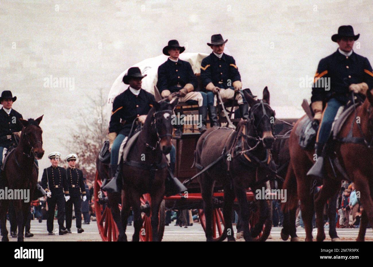 U. S. Army soldiers, wearing the Civil War era uniform, ride in a horse ...