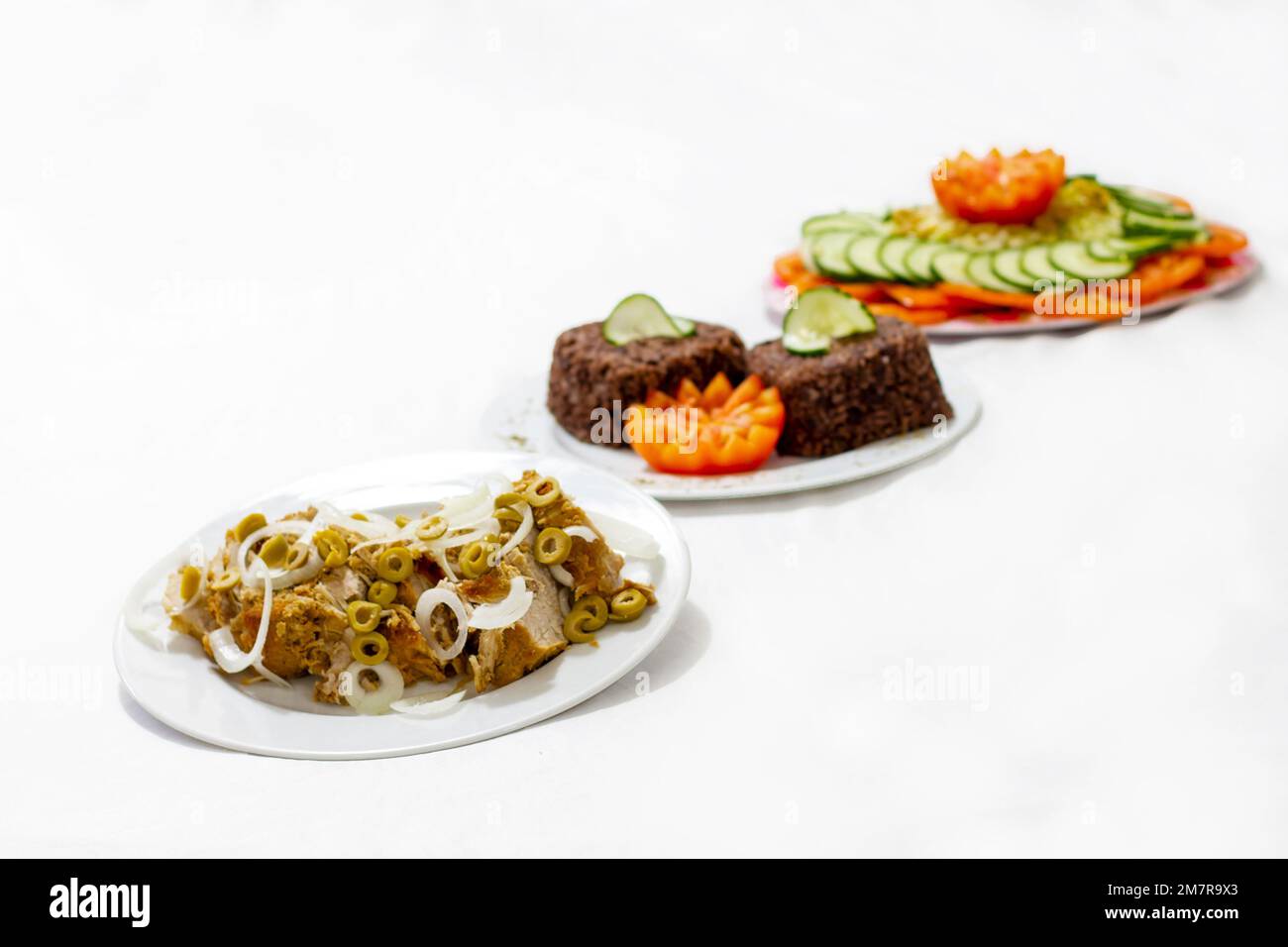 demonstration of Cuban food in three classic dishes Stock Photo - Alamy