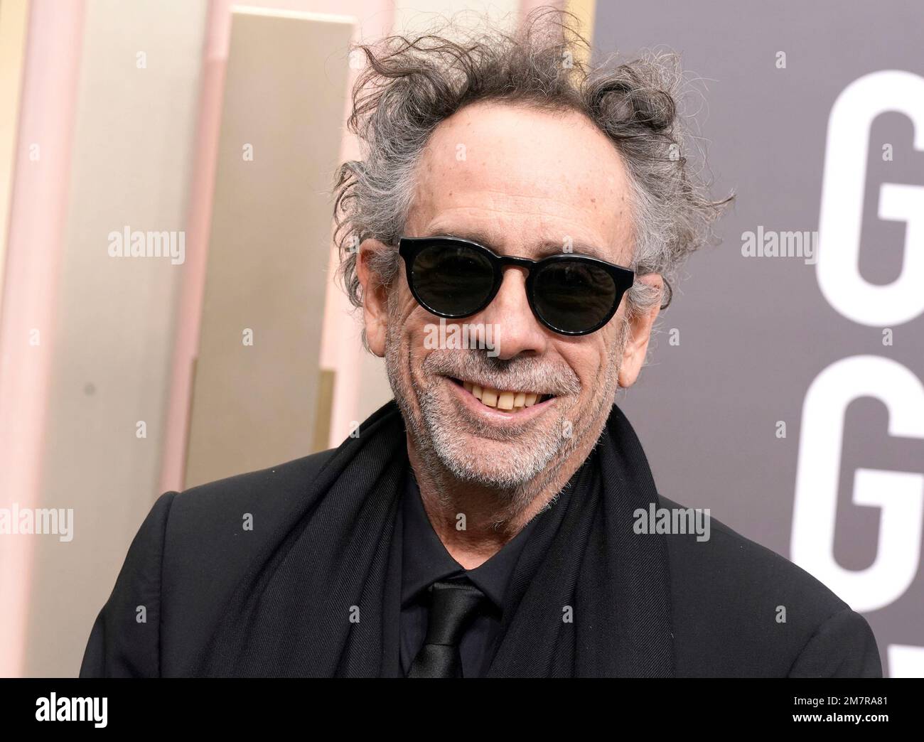 Tim Burton arrives at the 80th annual Golden Globe Awards at the ...