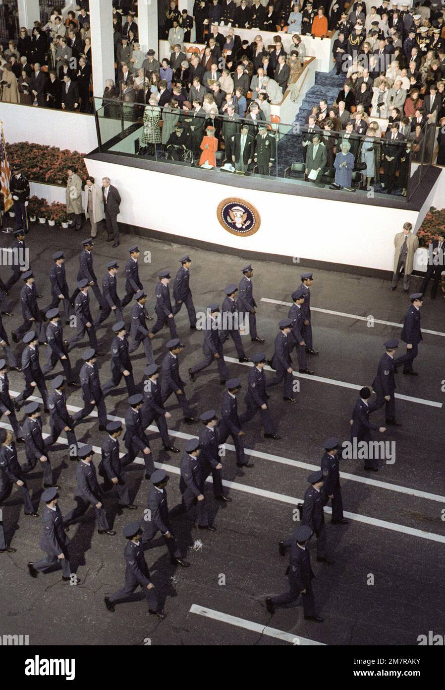 An Air Force marching unit passes in review in front of the ...