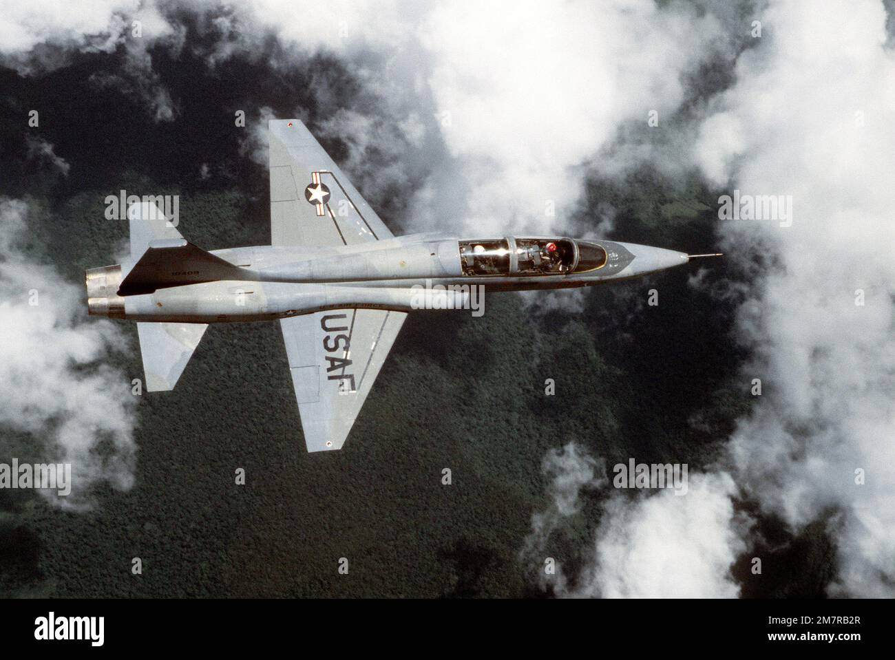 Air-to-air overhead view of an T-38 Talon aircraft in flight. Base: Clark Air Base State: Luzon ...