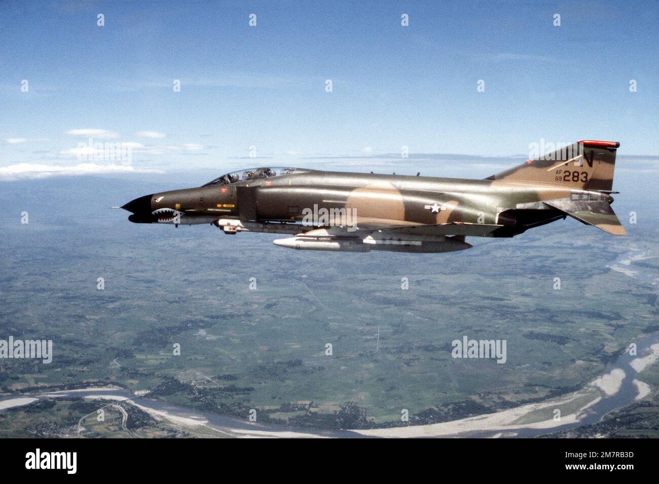 AN air-to-air left side view of an F-4G Phantom II Advanced Wild Weasel ...