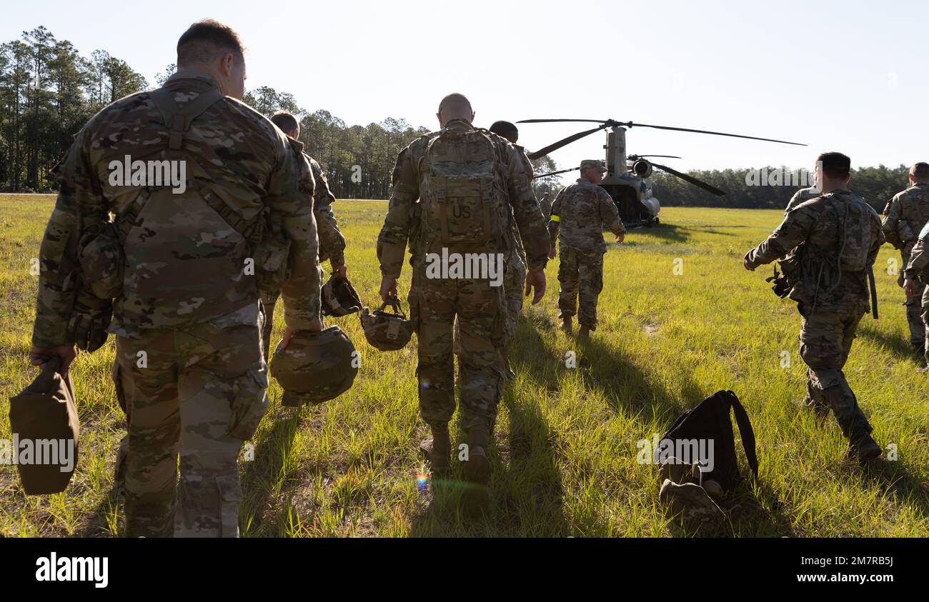 National Guard Soldiers walk to board a CH-47F aircraft in the Region 3 ...