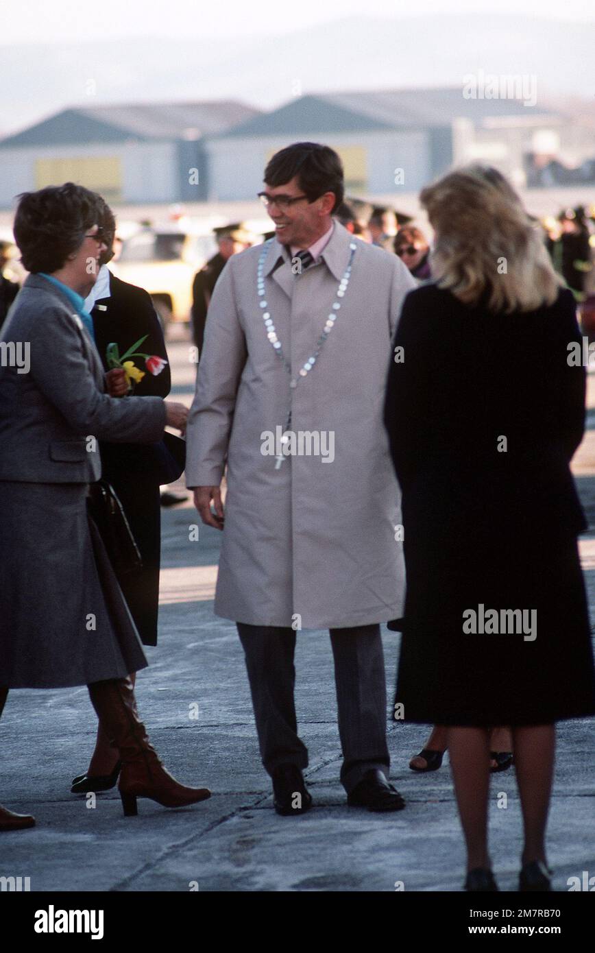 Bruce Laingen, wearing decoration, is greeted by his family as he ...