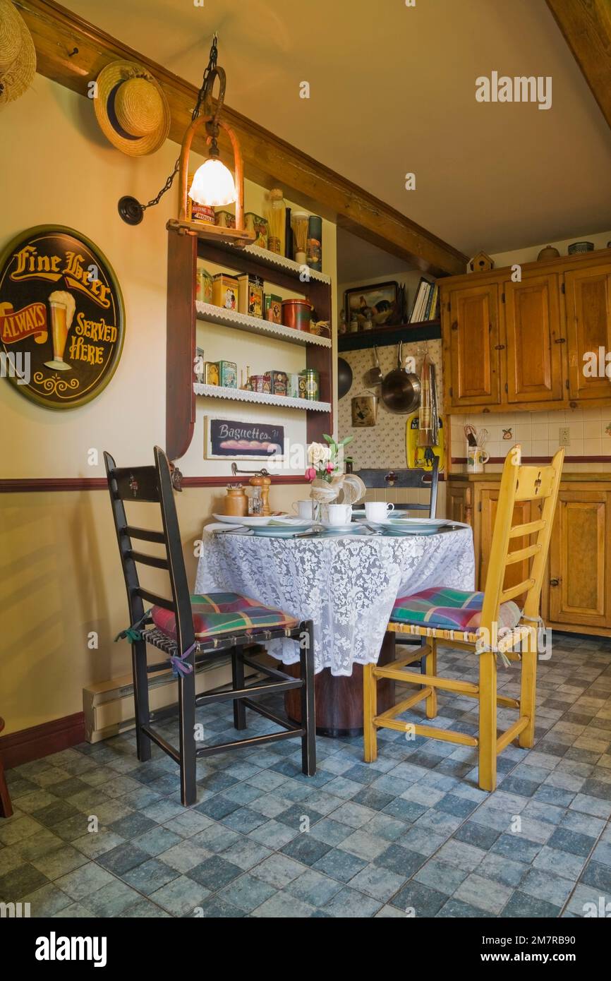 Wooden antique chairs and breakfast table in kitchen inside old ...