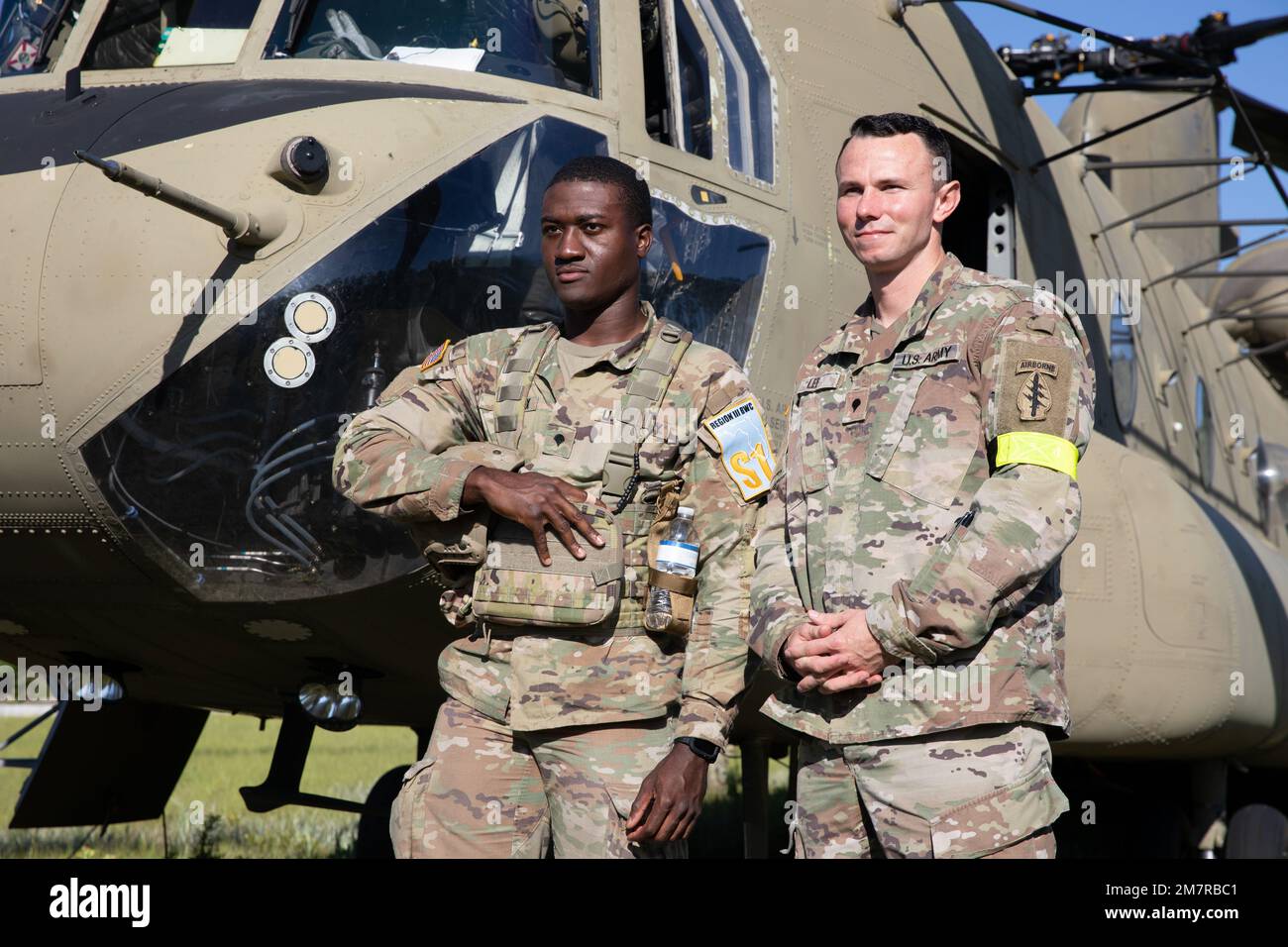Spc. Cassandrew Delicieux (left), a wheeled vehicle mechanic with the ...