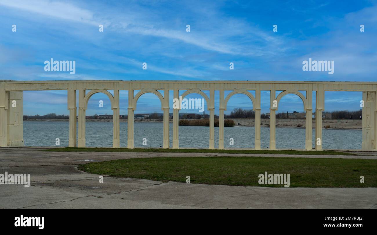 The arches near the river under a blue sky Stock Photo - Alamy