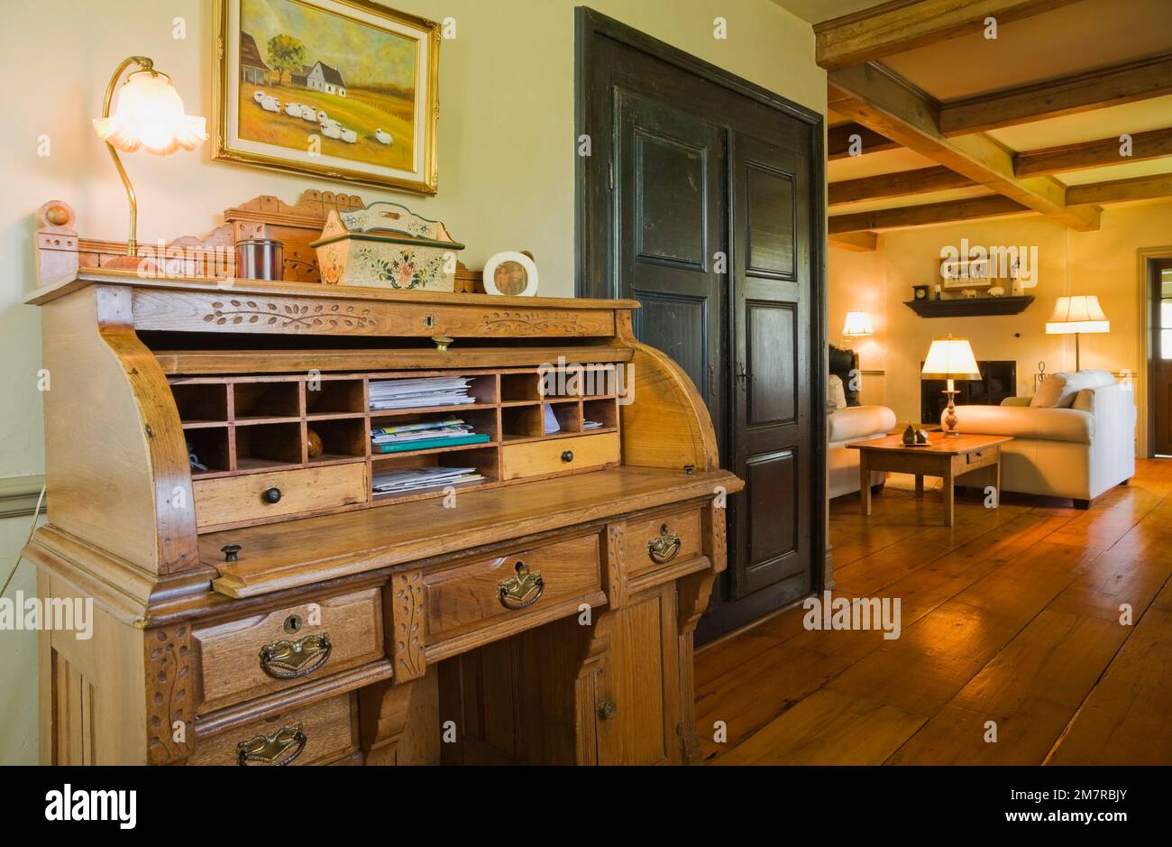 Roll top antique wooden secretary desk in parlour room inside old ...