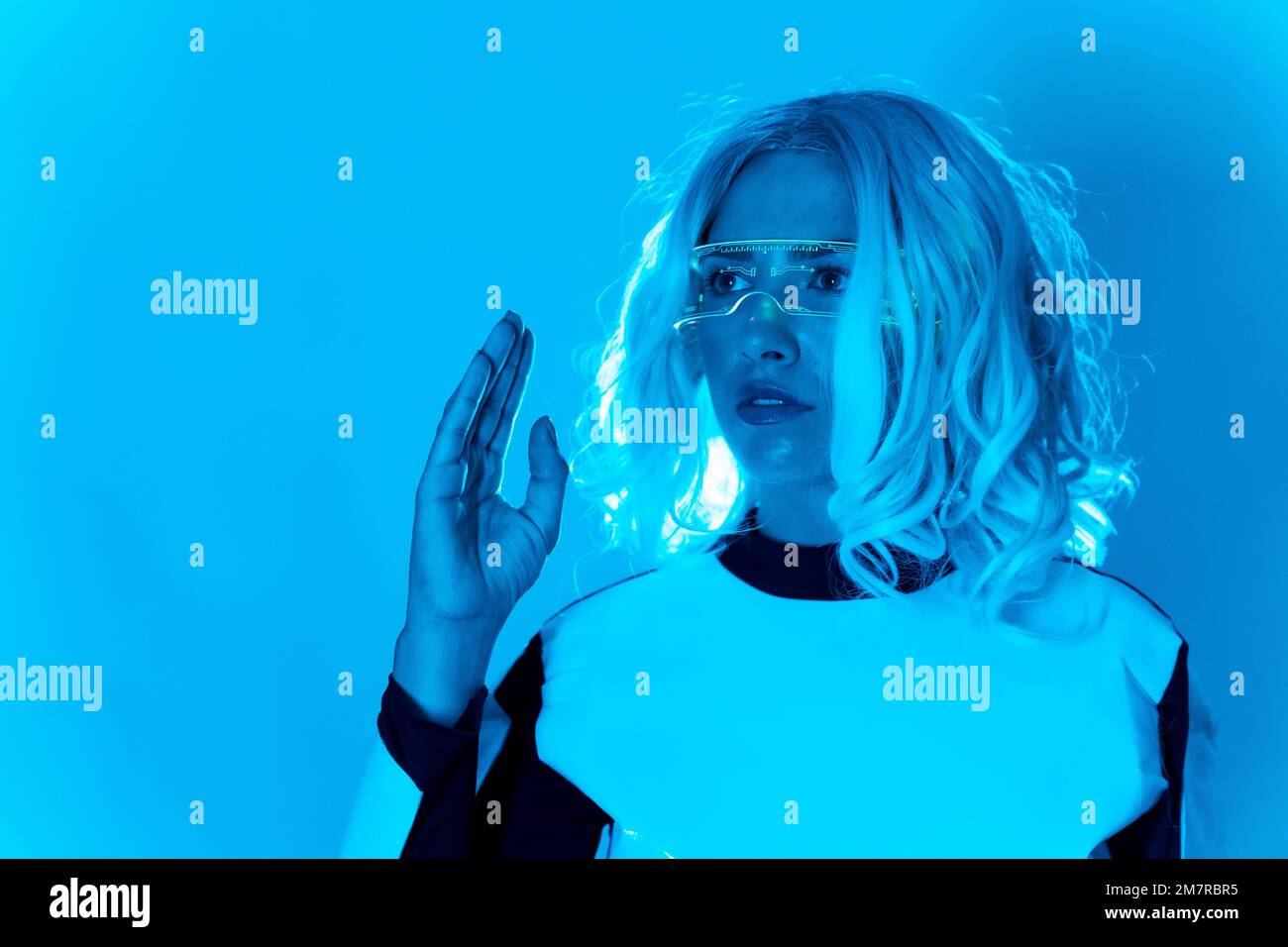 Futuristic concept, silhouette of a young woman with glasses from the ...