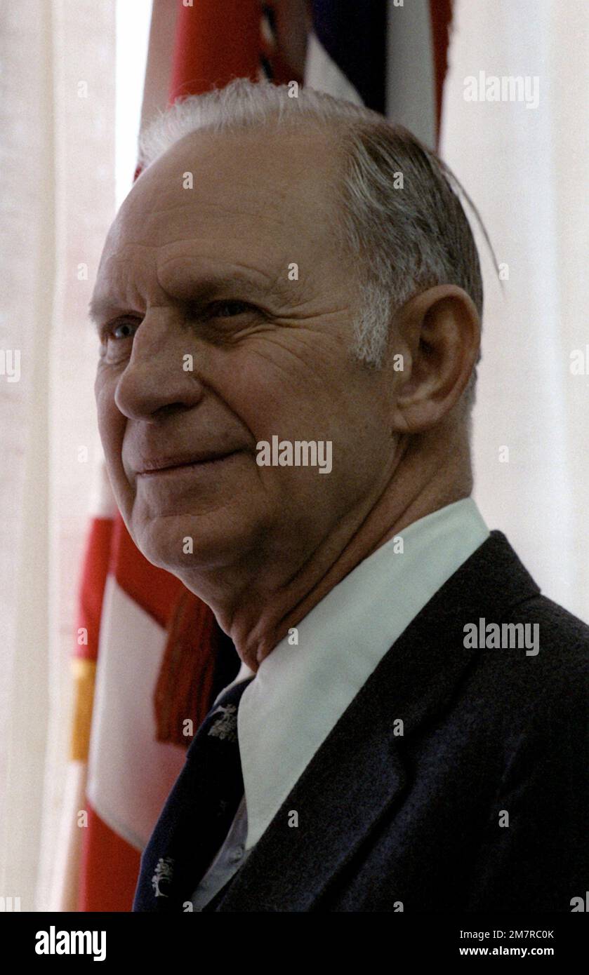 A candid photograph of Secretary of the Air Force Verne Orr standing in ...