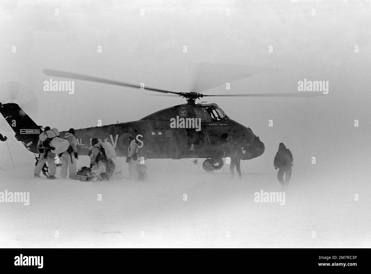 Norwegian military personnel board a British HC-2 Wessex helicopter ...