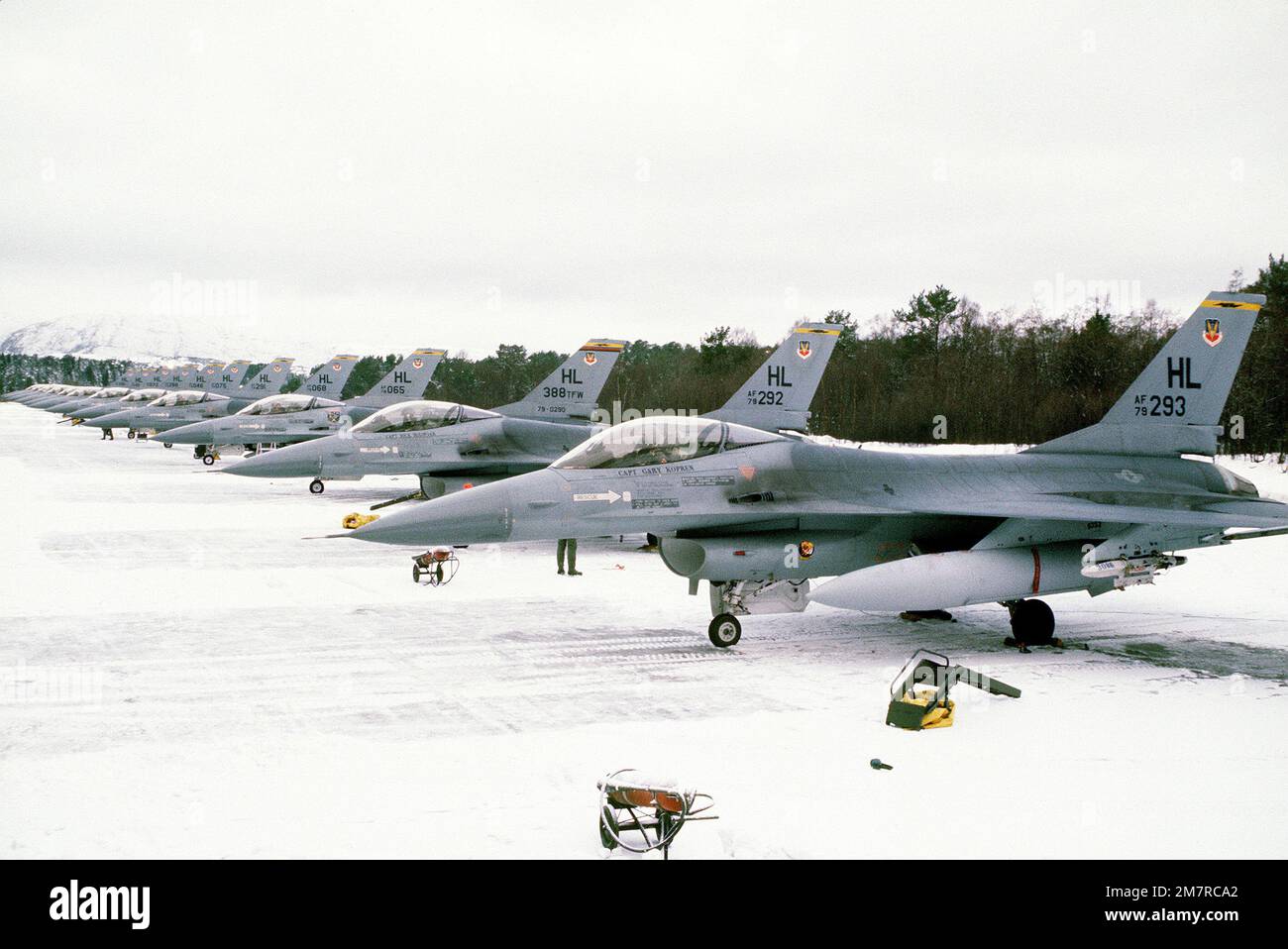 A left side view of a row of F-16 Fighting Falcon aircraft from the 4th ...