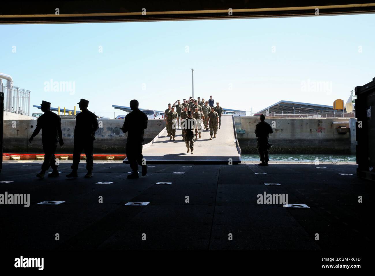 U.S. Marines and sailors board USS Portland (LPD-27) during 13th Marine ...